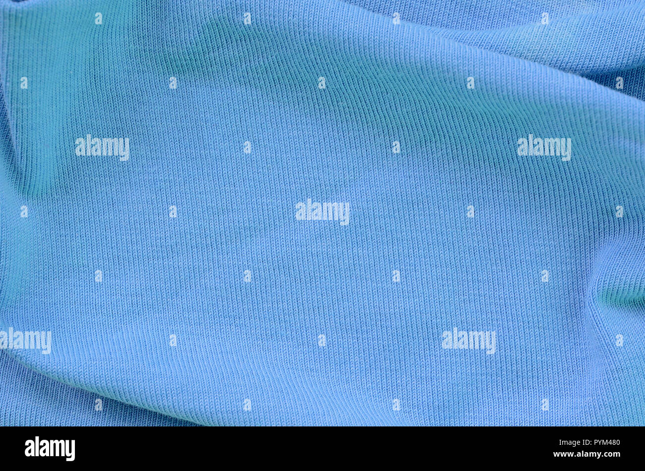 The texture of the fabric in blue color. Material for making shirts and ...