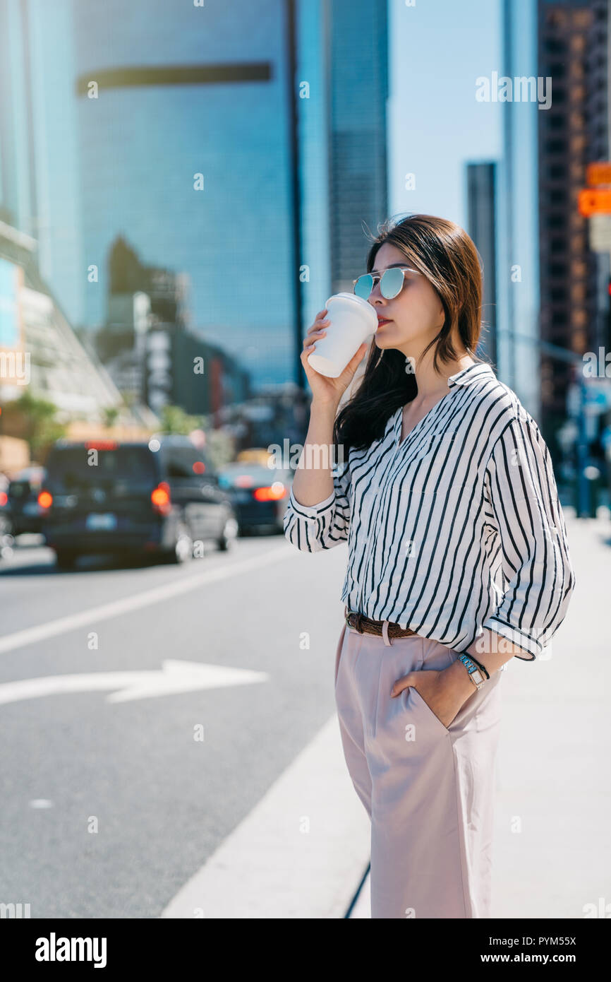 Office girl in street waiting hi-res stock photography and images - Alamy