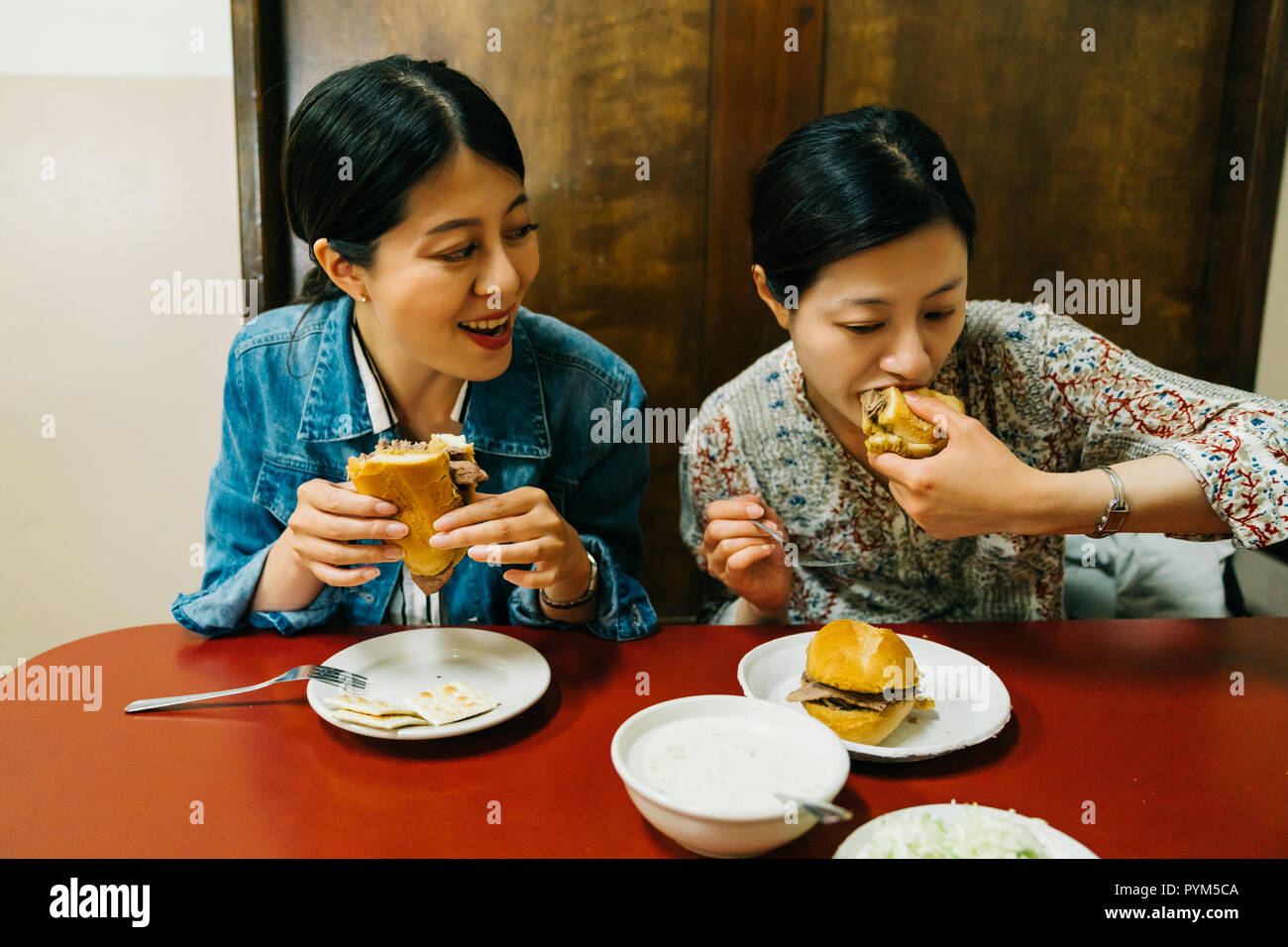 Group people old young sitting eating hi-res stock photography and ...