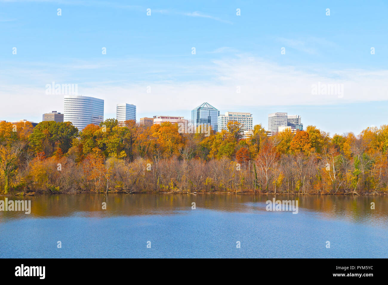 Modern multistory buildings in autumn near Potomac River in Washington ...