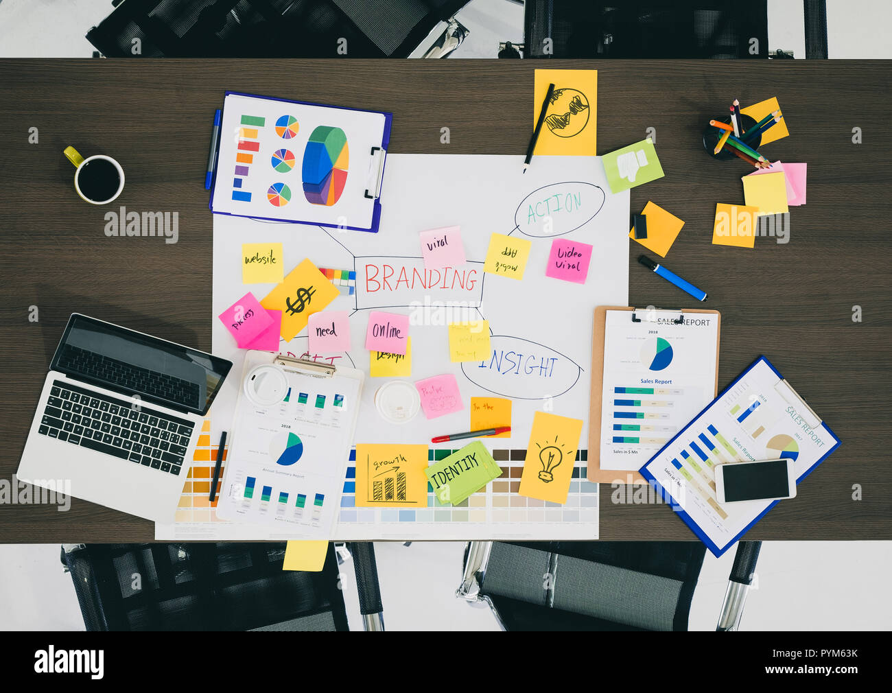 Top view of creative designer brainstorming ducument on wood table in ...