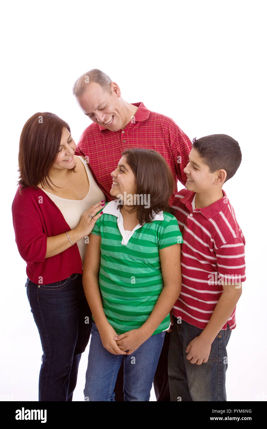 Happy Hispanic family hugging isolated on white Stock Photo - Alamy