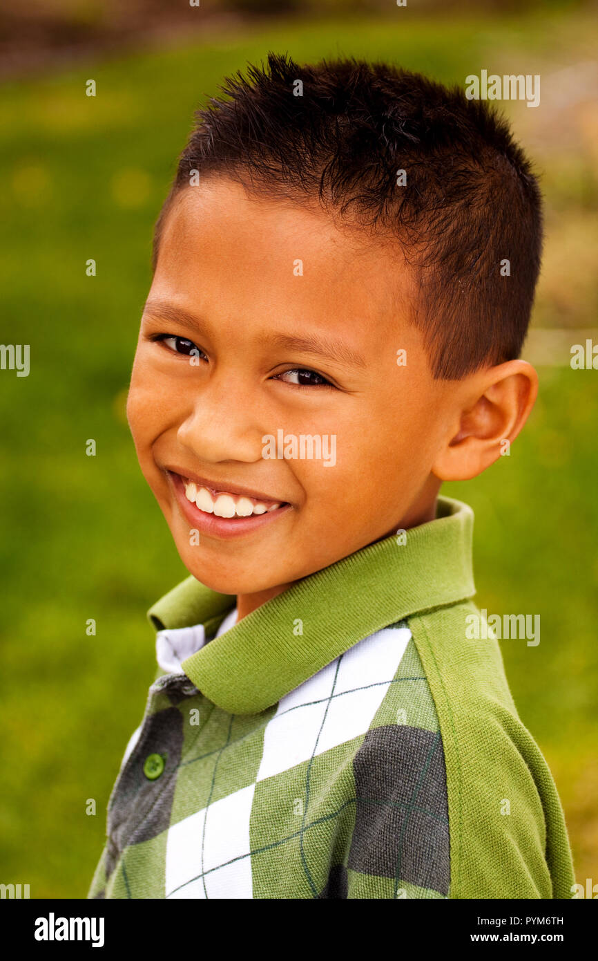 Happy young Asian kid smiling and laughing Stock Photo - Alamy