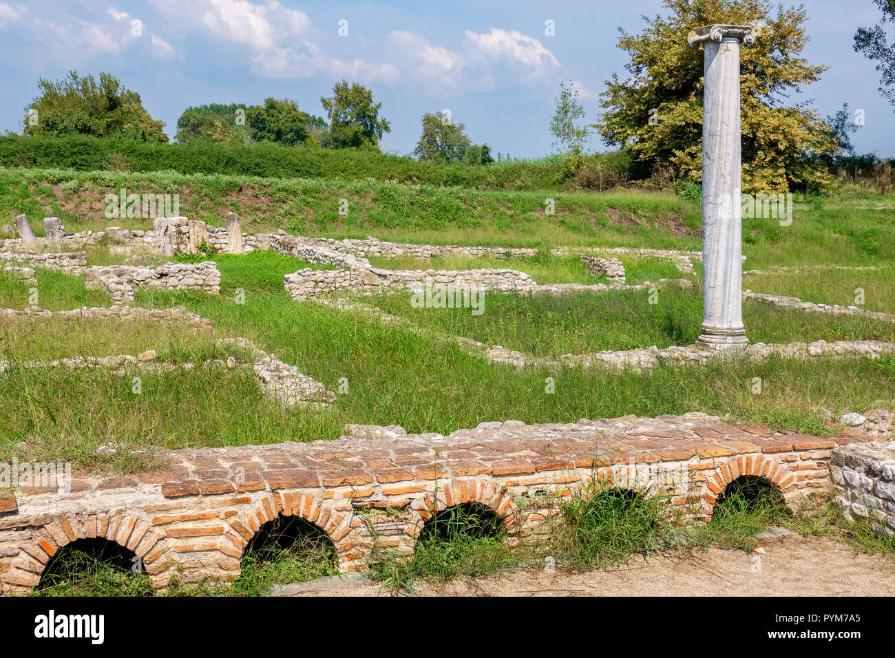 Landscape with column and ancient walls at Dion Archeological Site ...