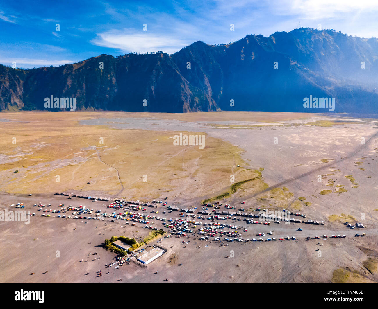 Aerial view of tourist jeeps at parking area, Bromo volcano, Indonesia ...