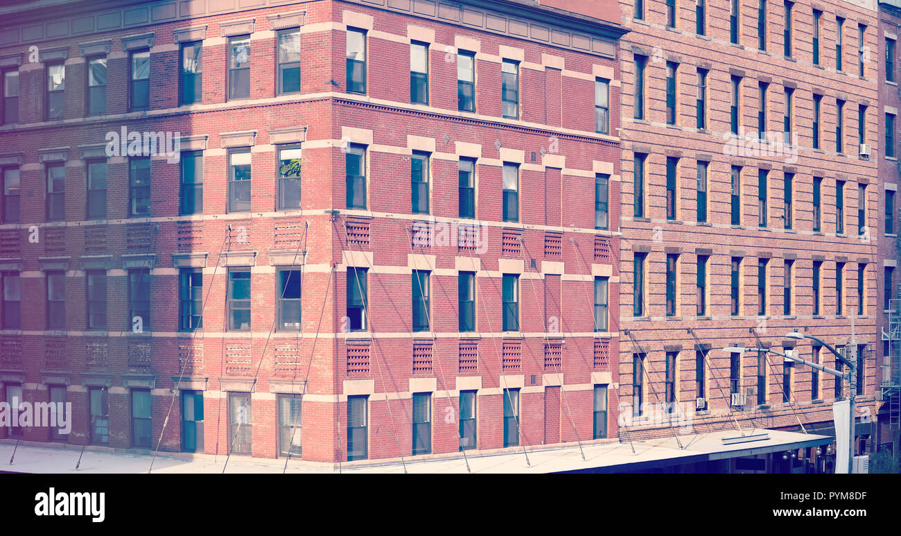 Vintage stylized picture of old brick buildings in downtown New York ...