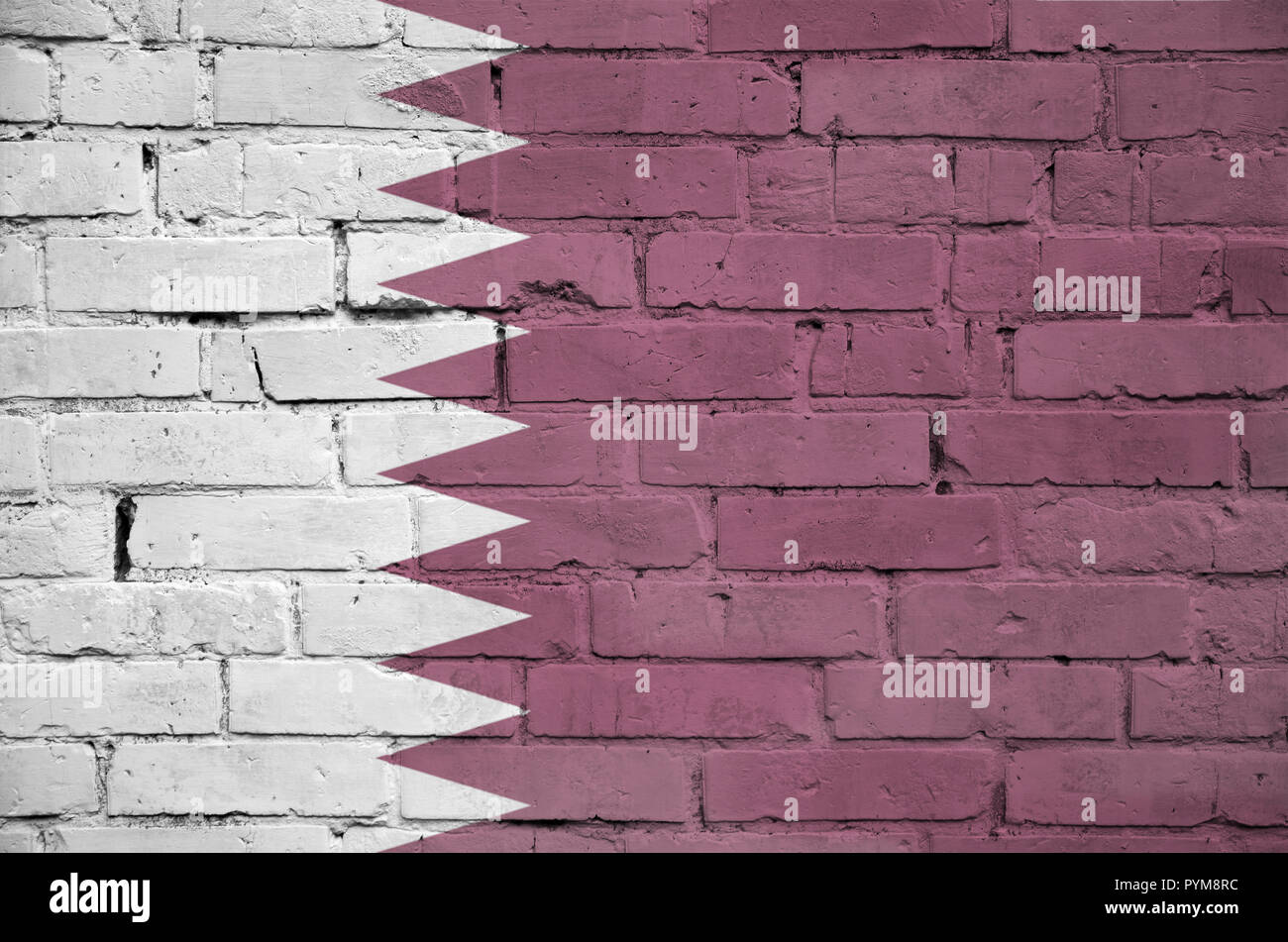 Qatar flag is painted onto an old brick wall Stock Photo - Alamy