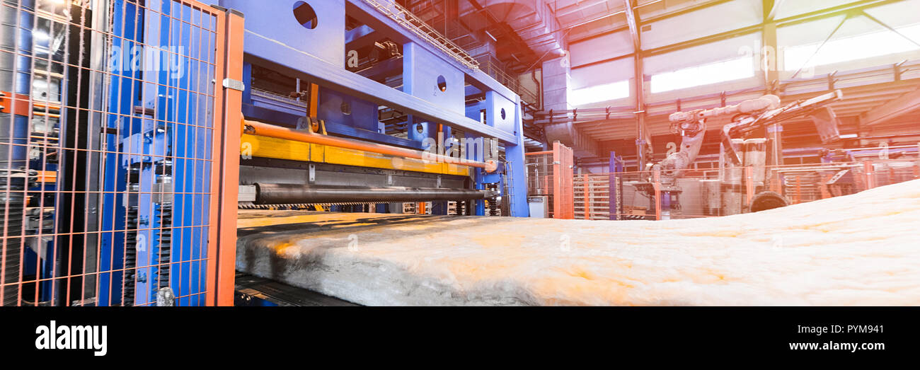 Fiberglass production industry equipment at manufacture background ...