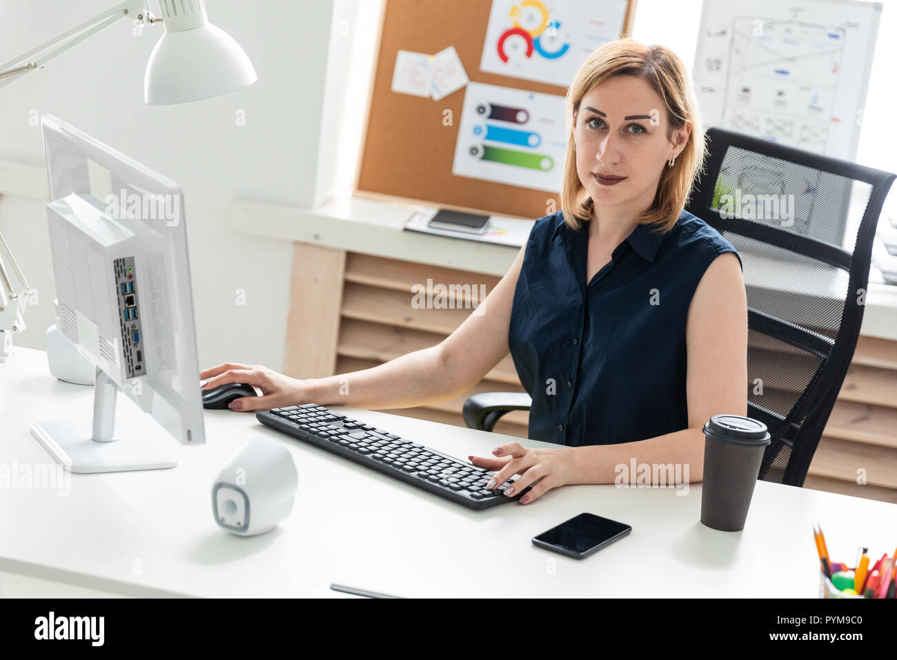 A young girl working at the computer Stock Photo - Alamy