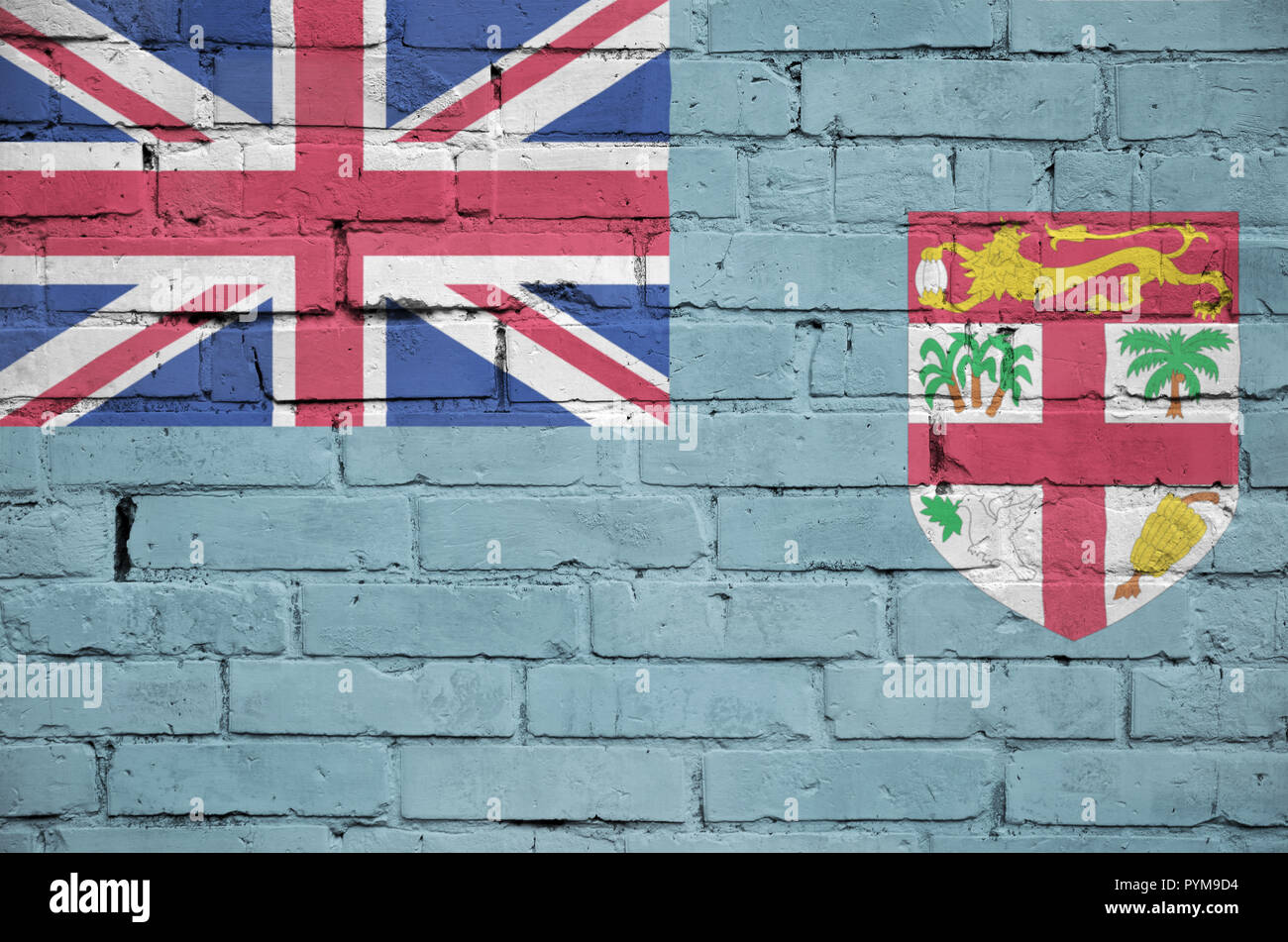 Fiji flag is painted onto an old brick wall Stock Photo - Alamy