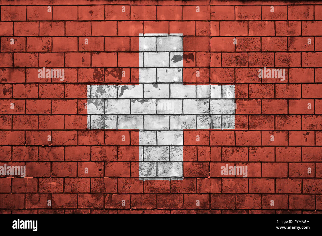 Switzerland flag is painted onto an old brick wall Stock Photo - Alamy