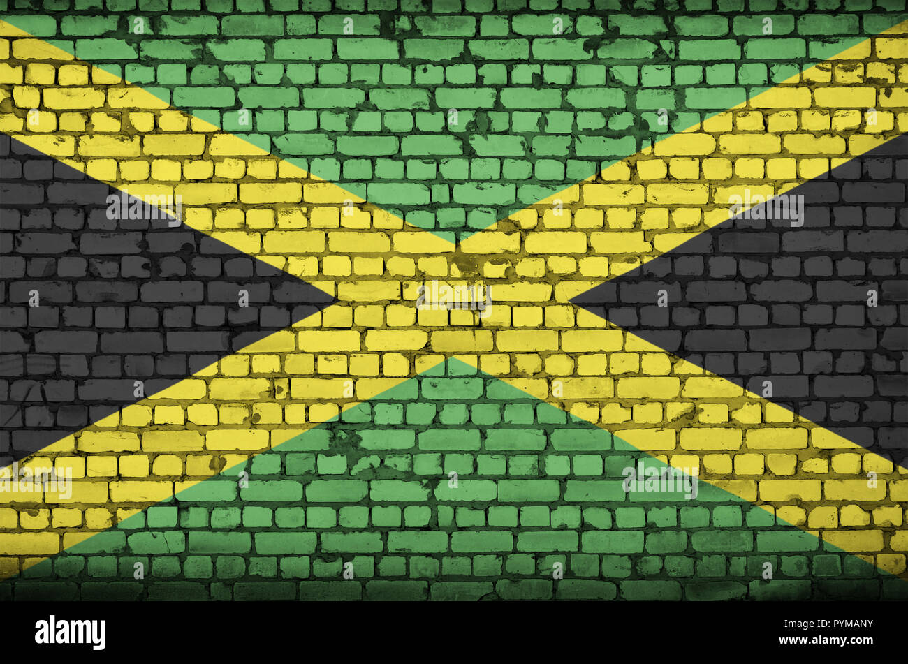 Jamaica flag is painted onto an old brick wall Stock Photo - Alamy