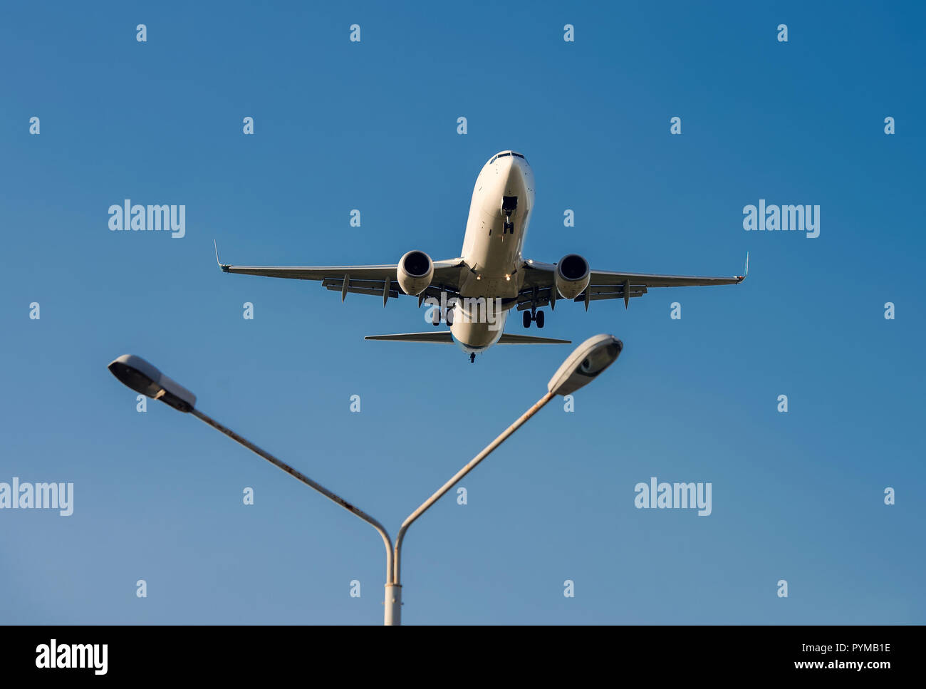 aircraft flying in the sky. front view Stock Photo - Alamy