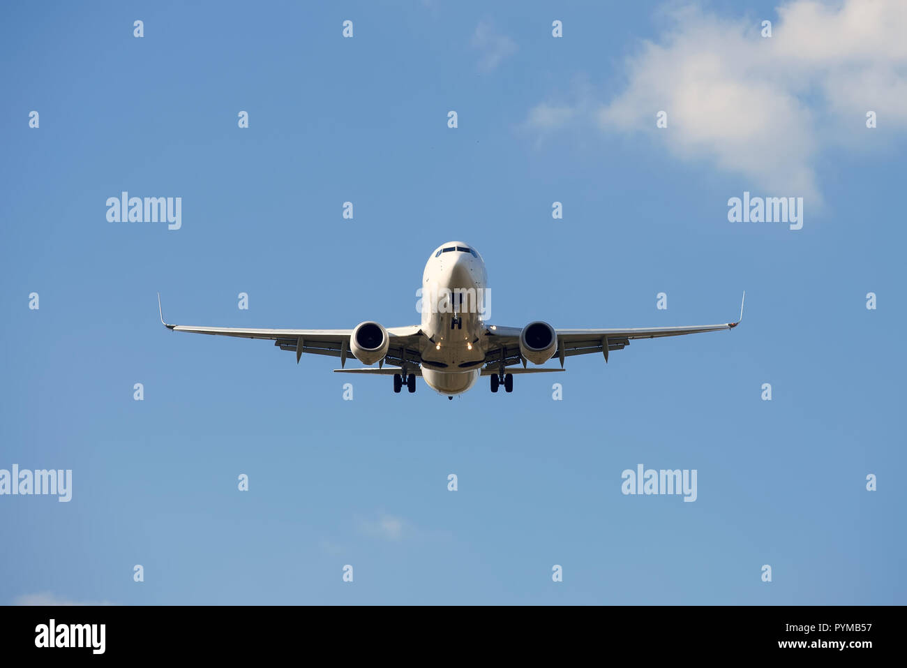 aircraft flying in the sky. front view Stock Photo - Alamy