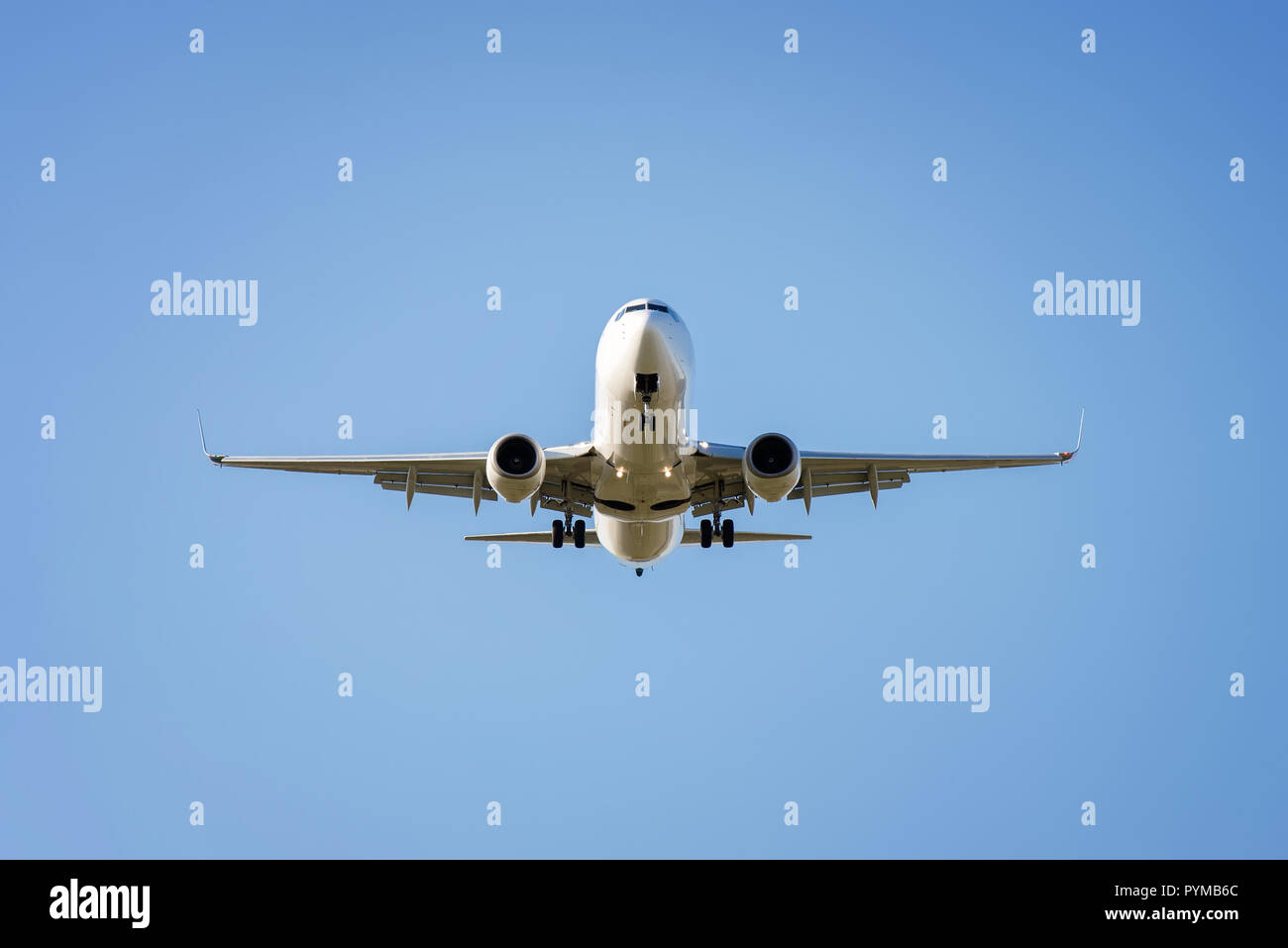 aircraft flying in the sky. front view Stock Photo - Alamy