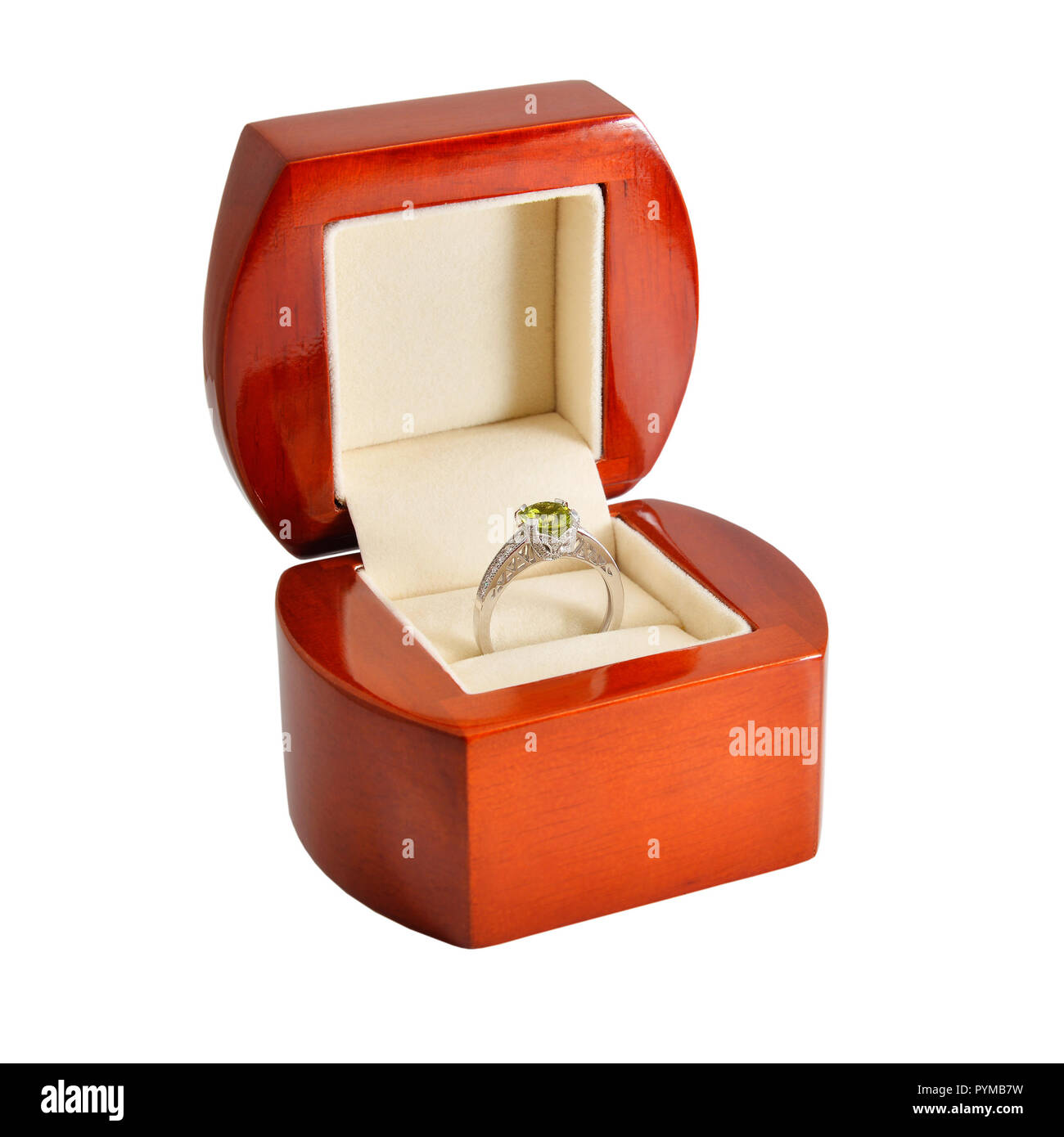 gold ring with a jewel in a wooden box isolated on white background ...