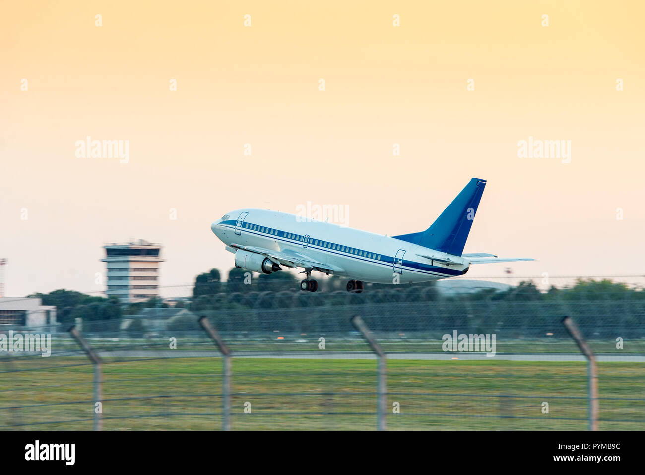 Plane taking off sunset from hi-res stock photography and images - Alamy