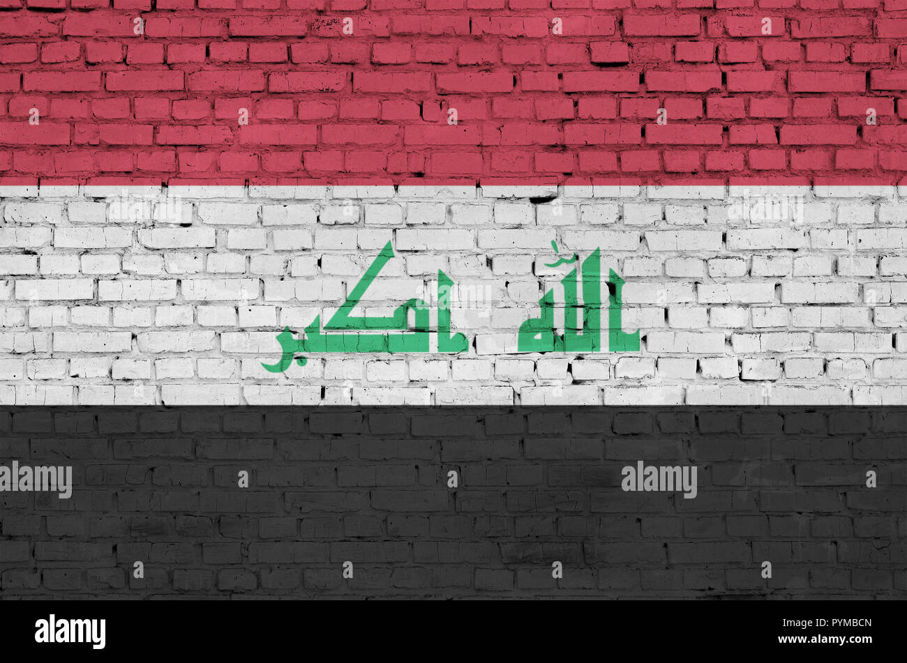 Iraq flag is painted onto an old brick wall Stock Photo - Alamy