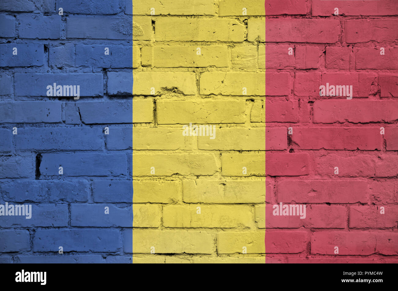 Romania flag is painted onto an old brick wall Stock Photo - Alamy