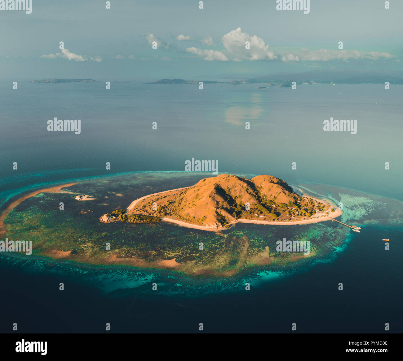 Lonely island, ocean. Aerial drone shot. Komodo. Stunning panoramic ...