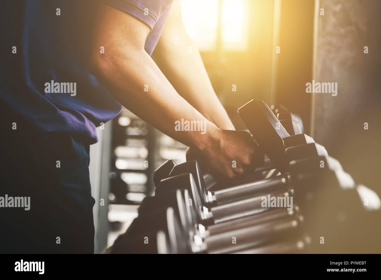 Muscle arm holding hi-res stock photography and images - Alamy