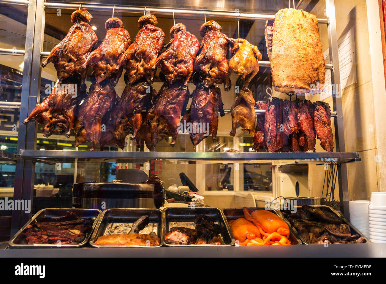 Display of a restaurant of Chinatown with crispy ducks hung in London ...