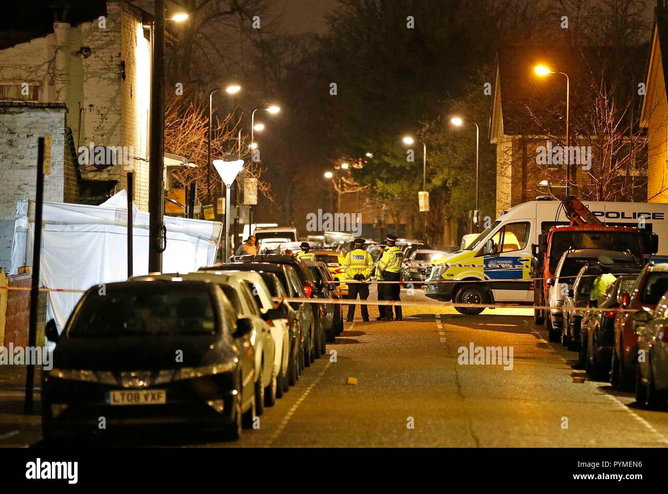 The Murder scene - Forensic Officers investigate the crime scene Stock ...