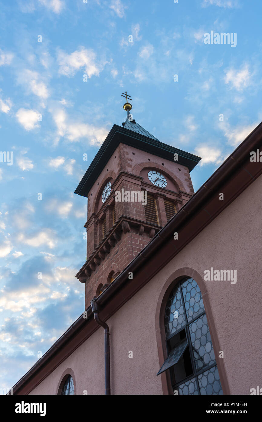 Germany, Church spire of village Elzach in golden hour light Stock ...