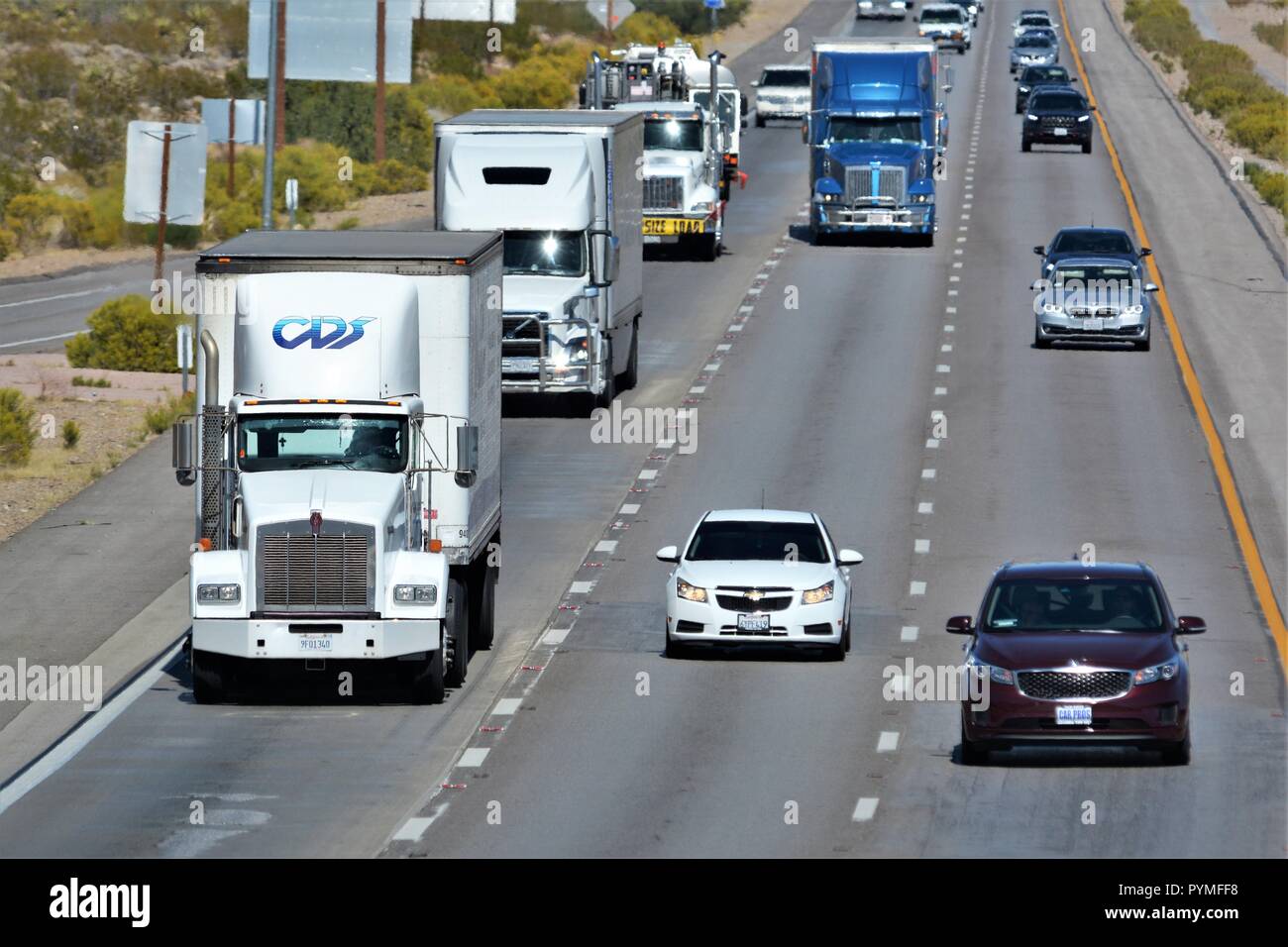 Trucks and cars on interstate highway in Nevada Stock Photo - Alamy