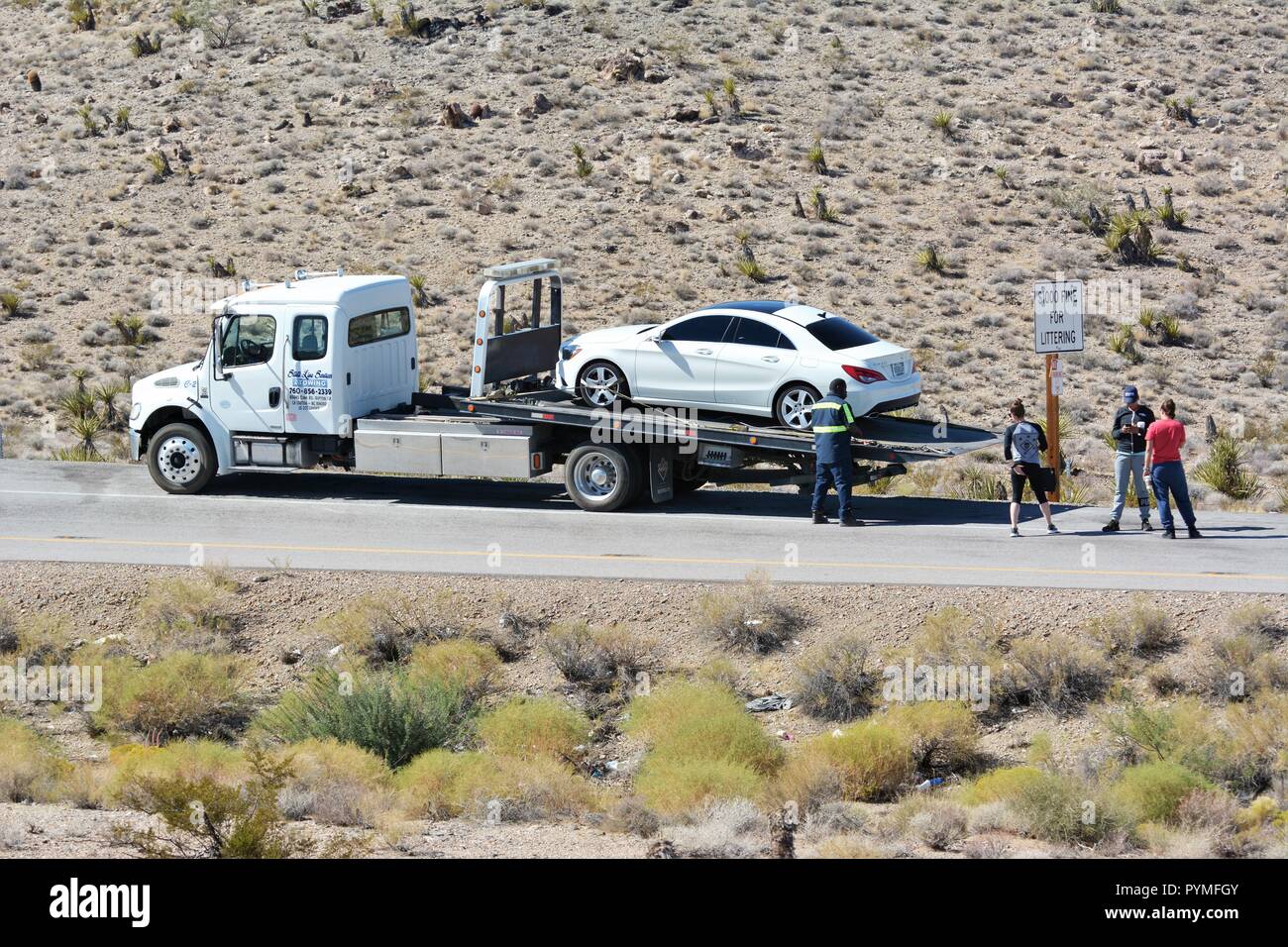 Stranded car on Freeway in California Desert Stock Photo - Alamy