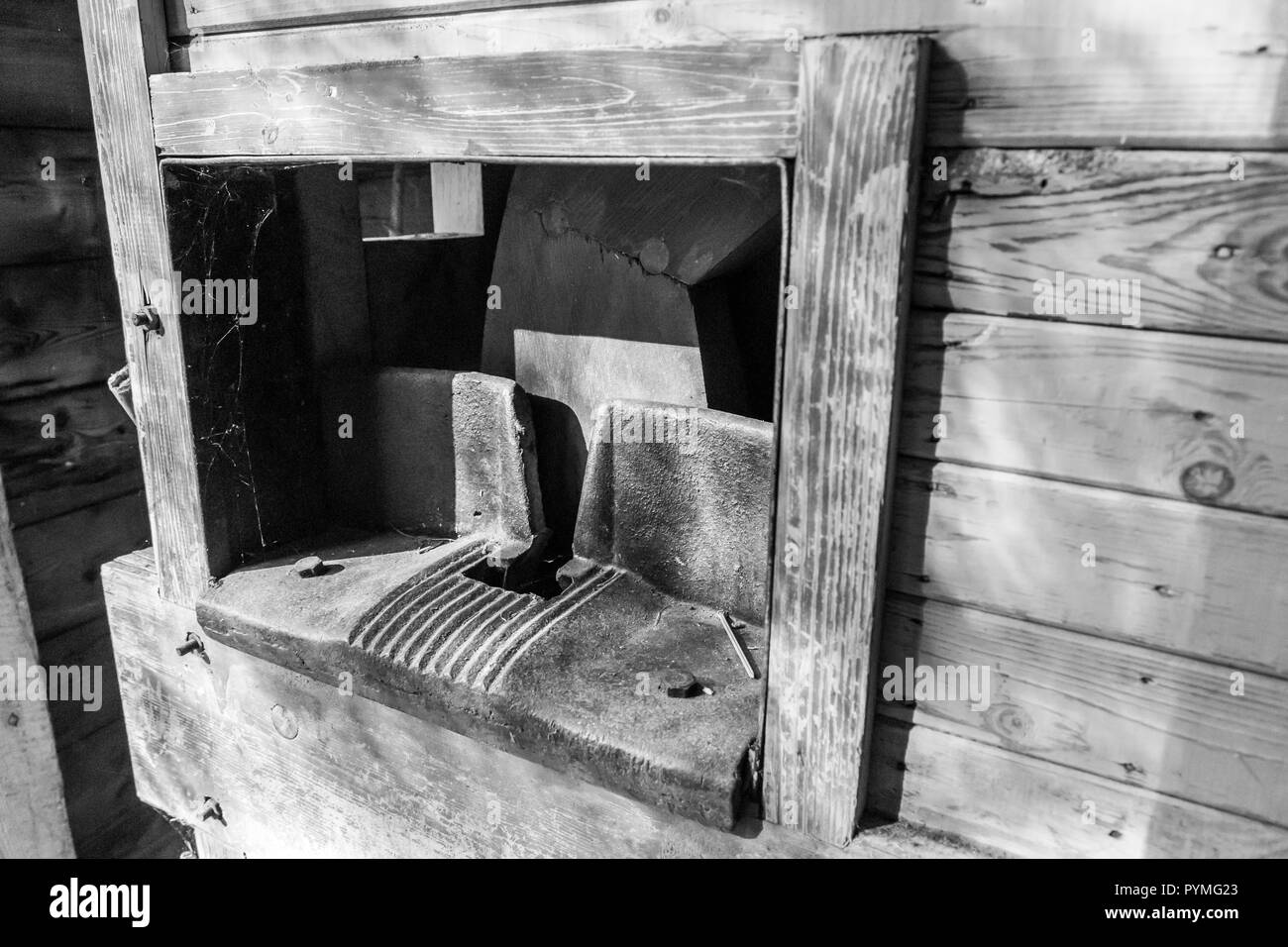 Antique wood splitter or chopper in an old Swedish farm in northern ...