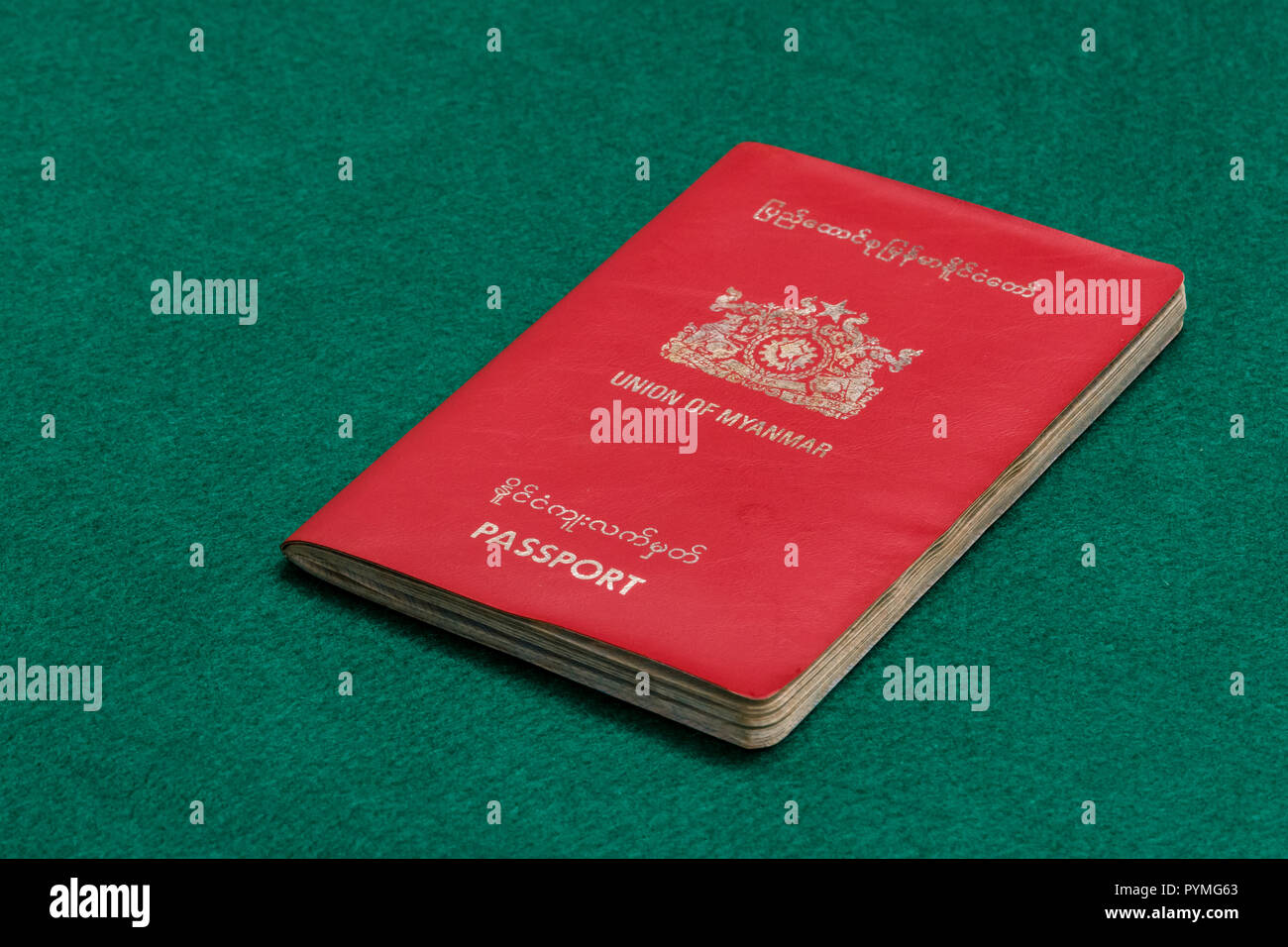 Myanmar Burmese passport on green table Stock Photo - Alamy