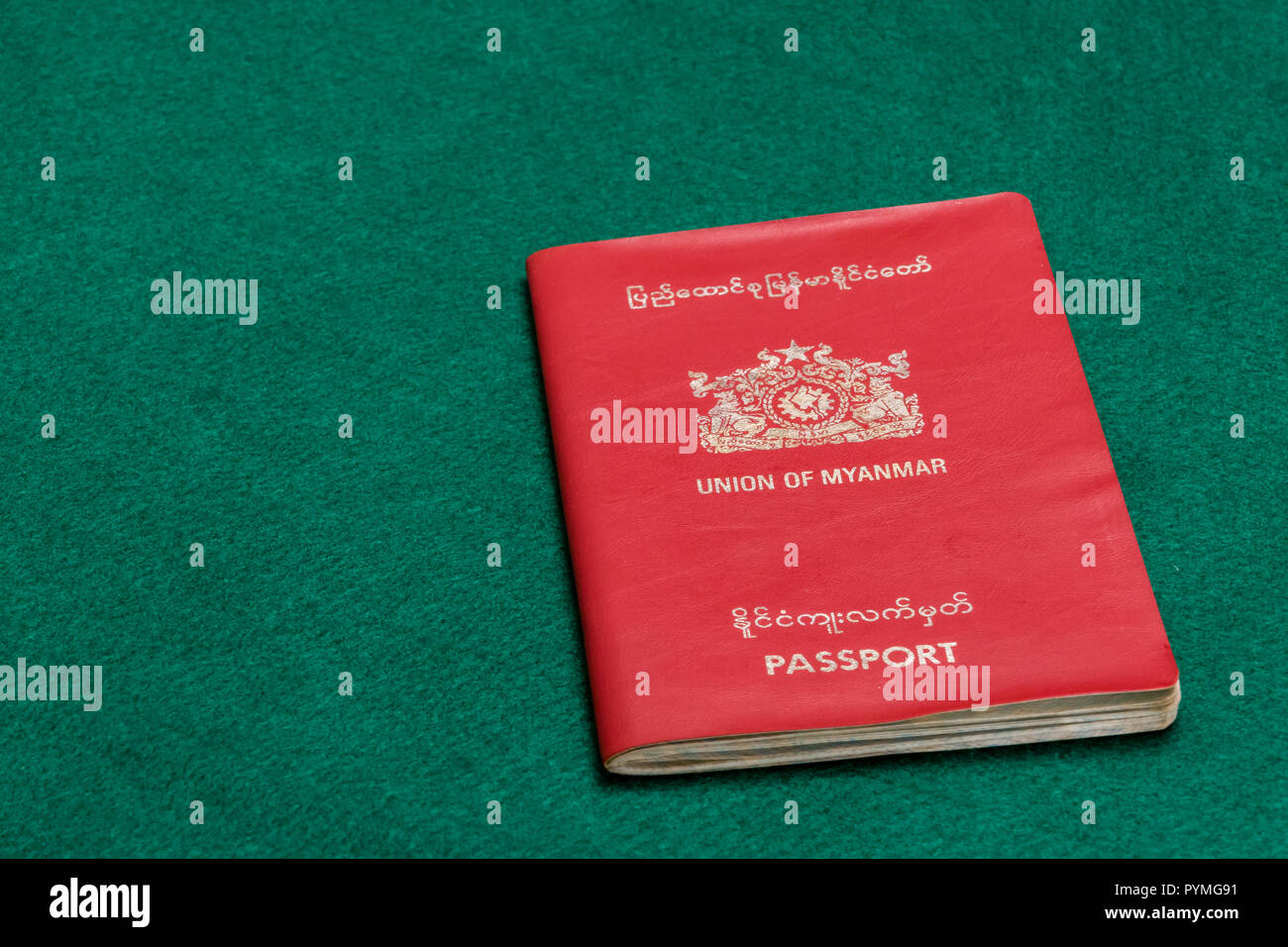 Myanmar Burmese passport on green table Stock Photo - Alamy