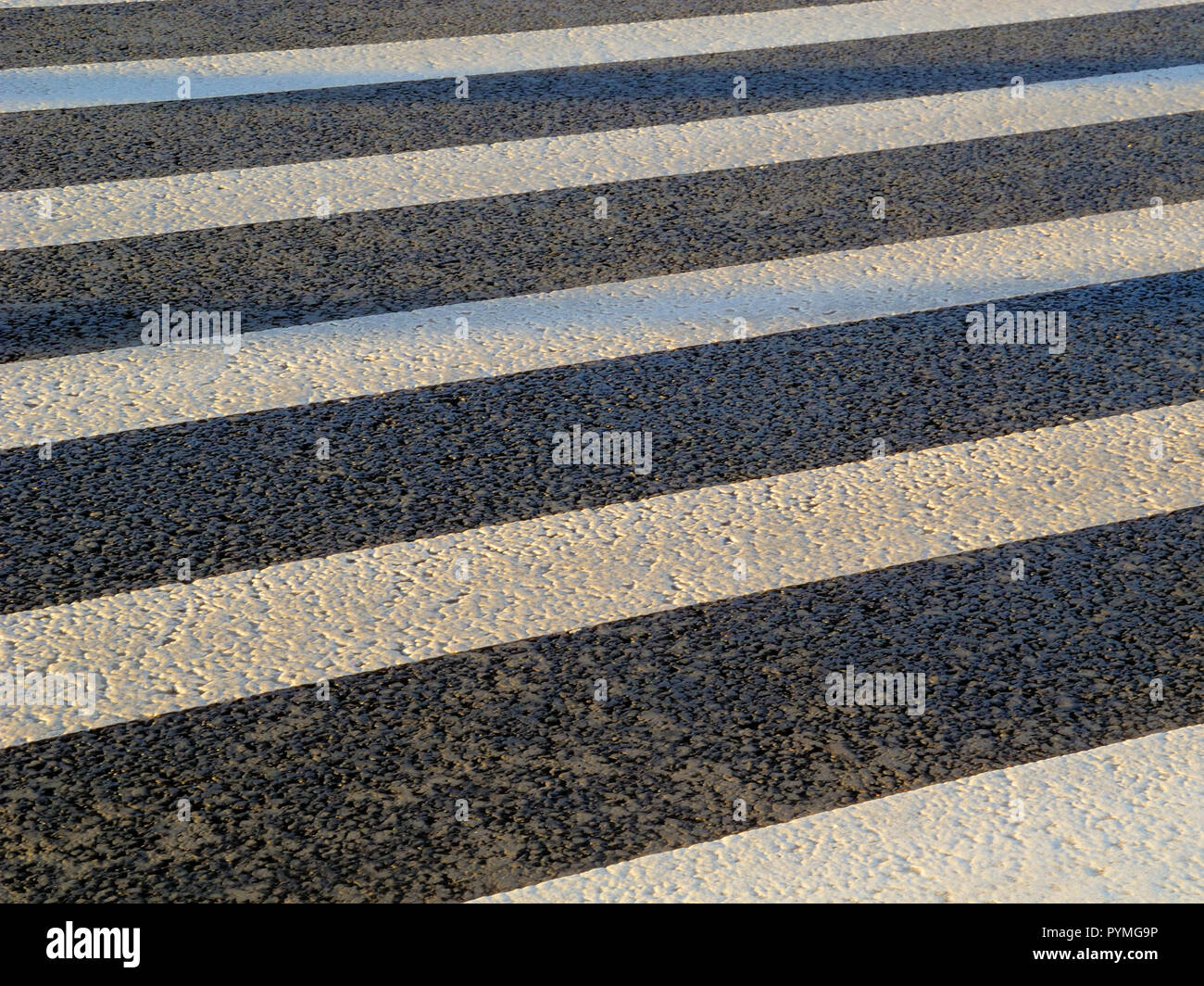 Marking pedestrian crossing.In the form of parallel white stripe Stock ...