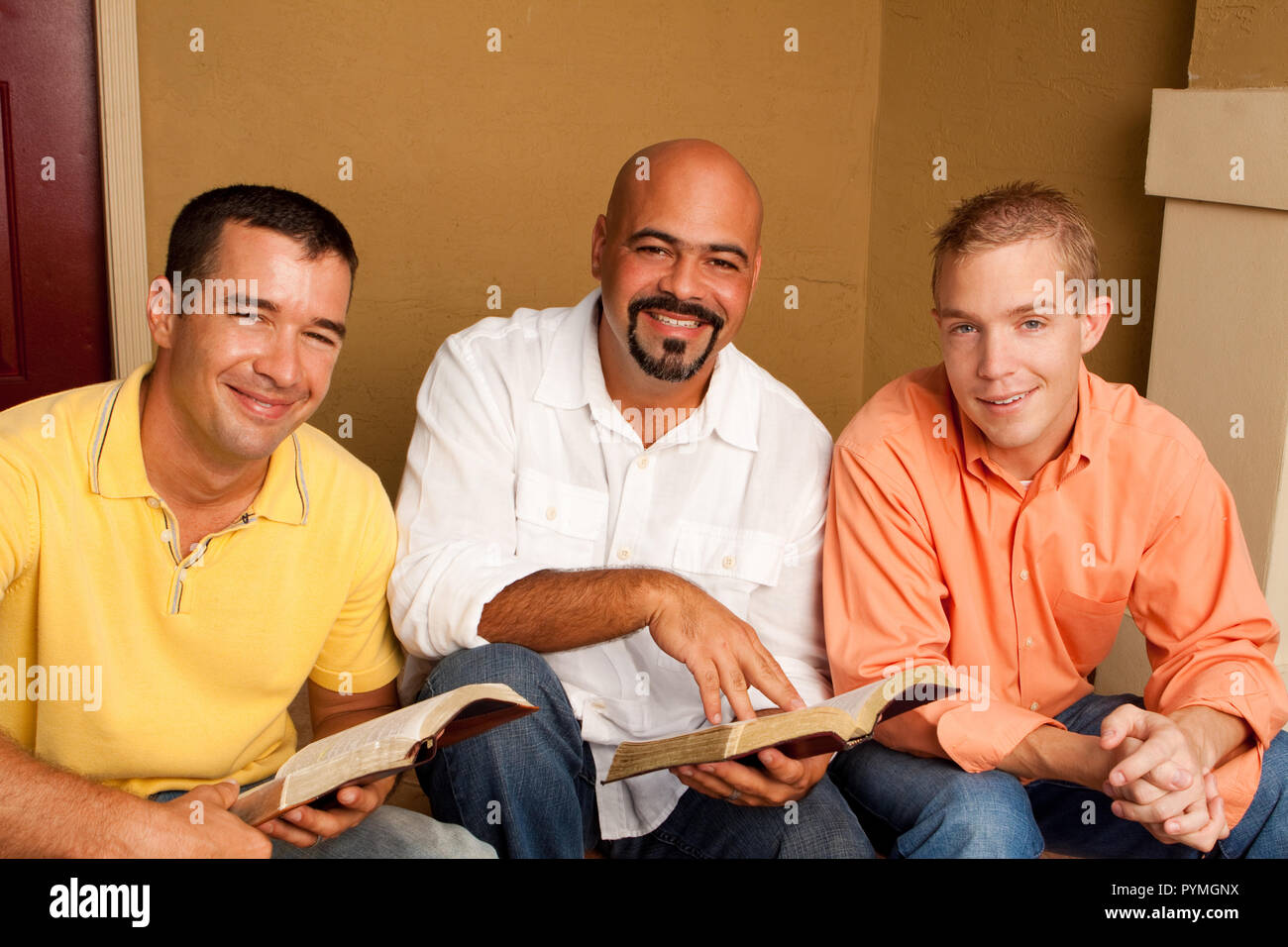 Multicultural small group. Men's Group Bible Study Stock Photo - Alamy
