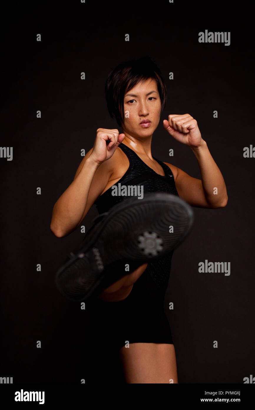 Asian woman kick boxing hi-res stock photography and images - Alamy