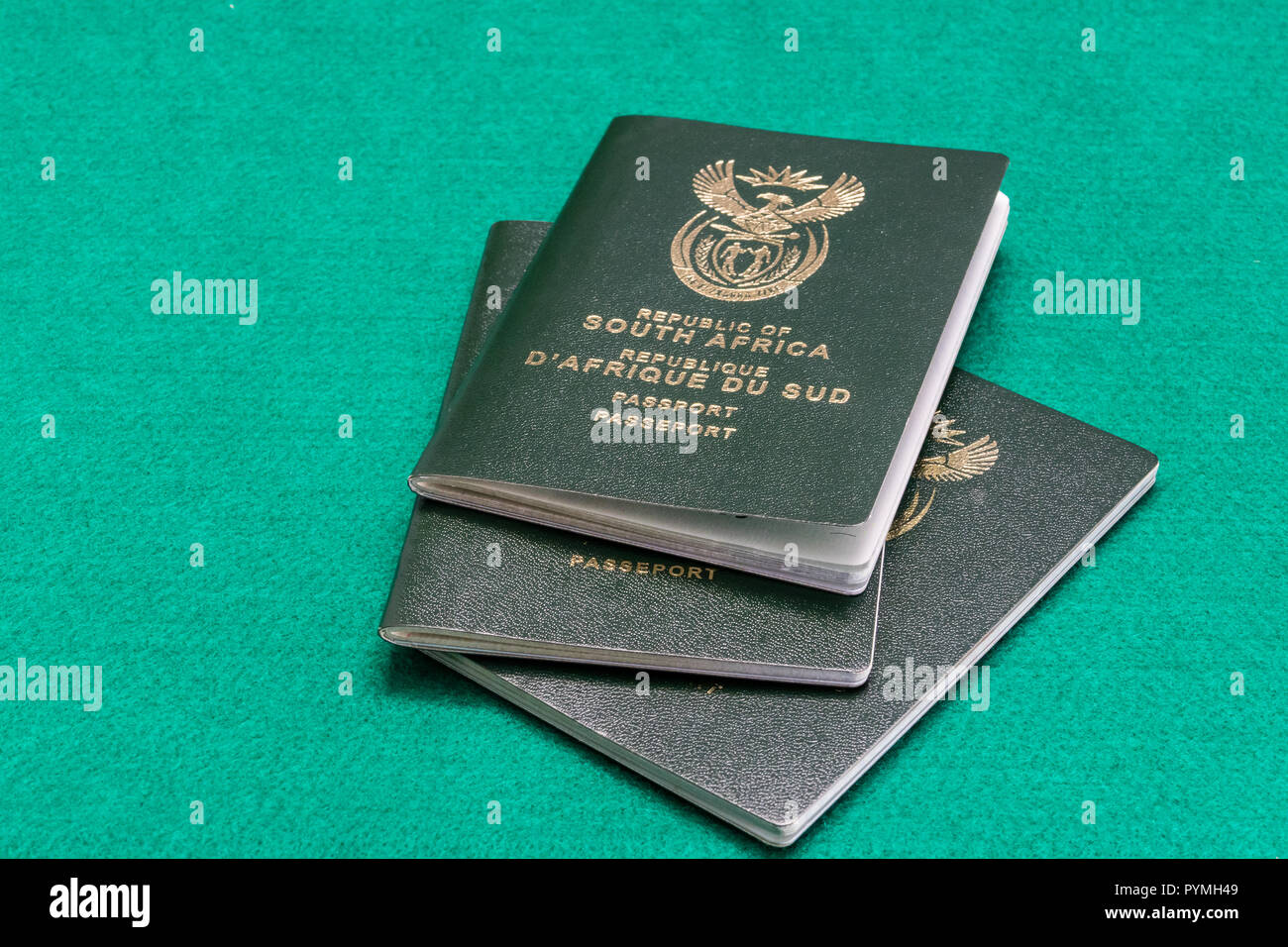South African passports on green background Stock Photo - Alamy