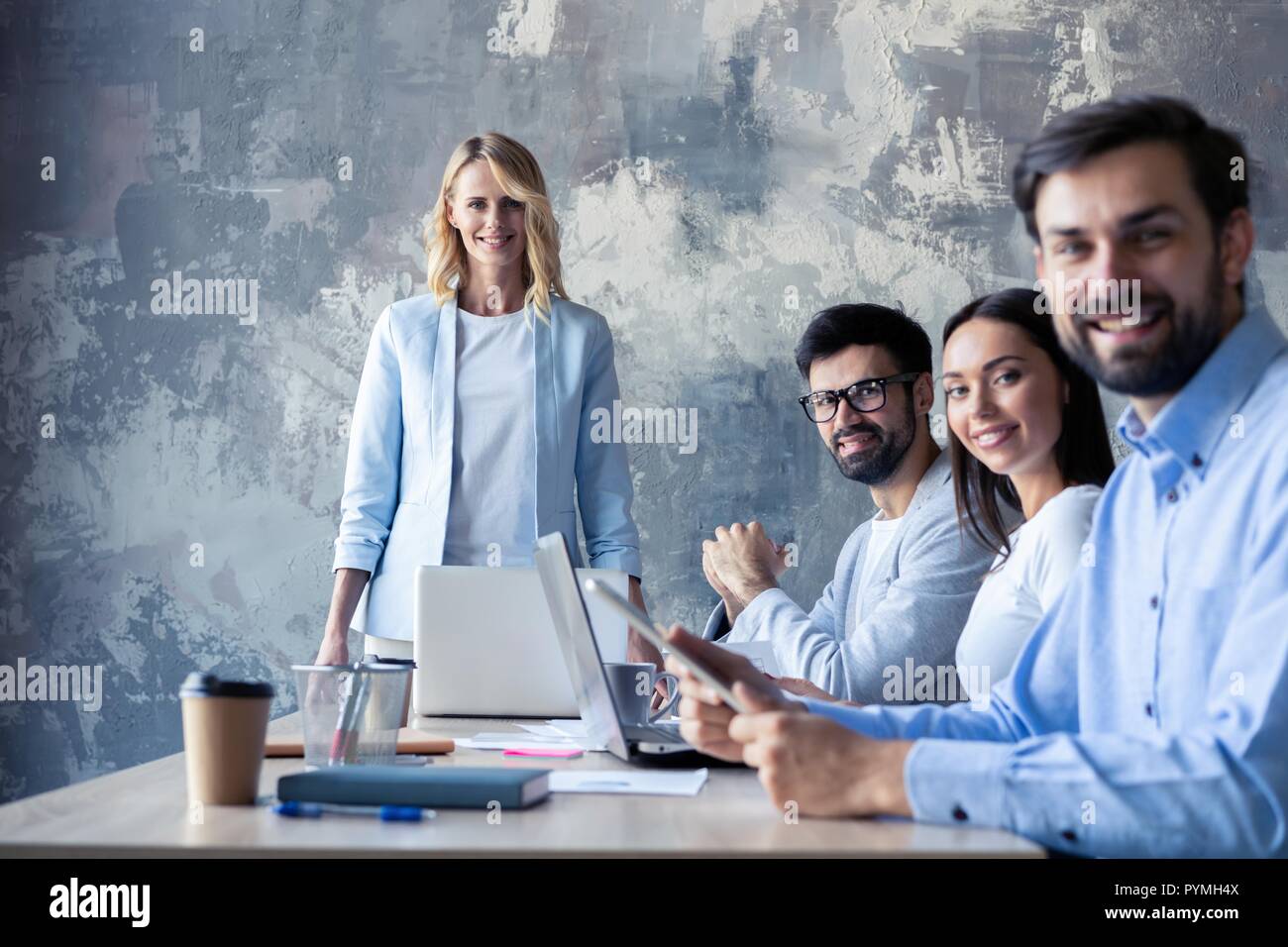 Successful company with happy workers in modern office Stock Photo - Alamy
