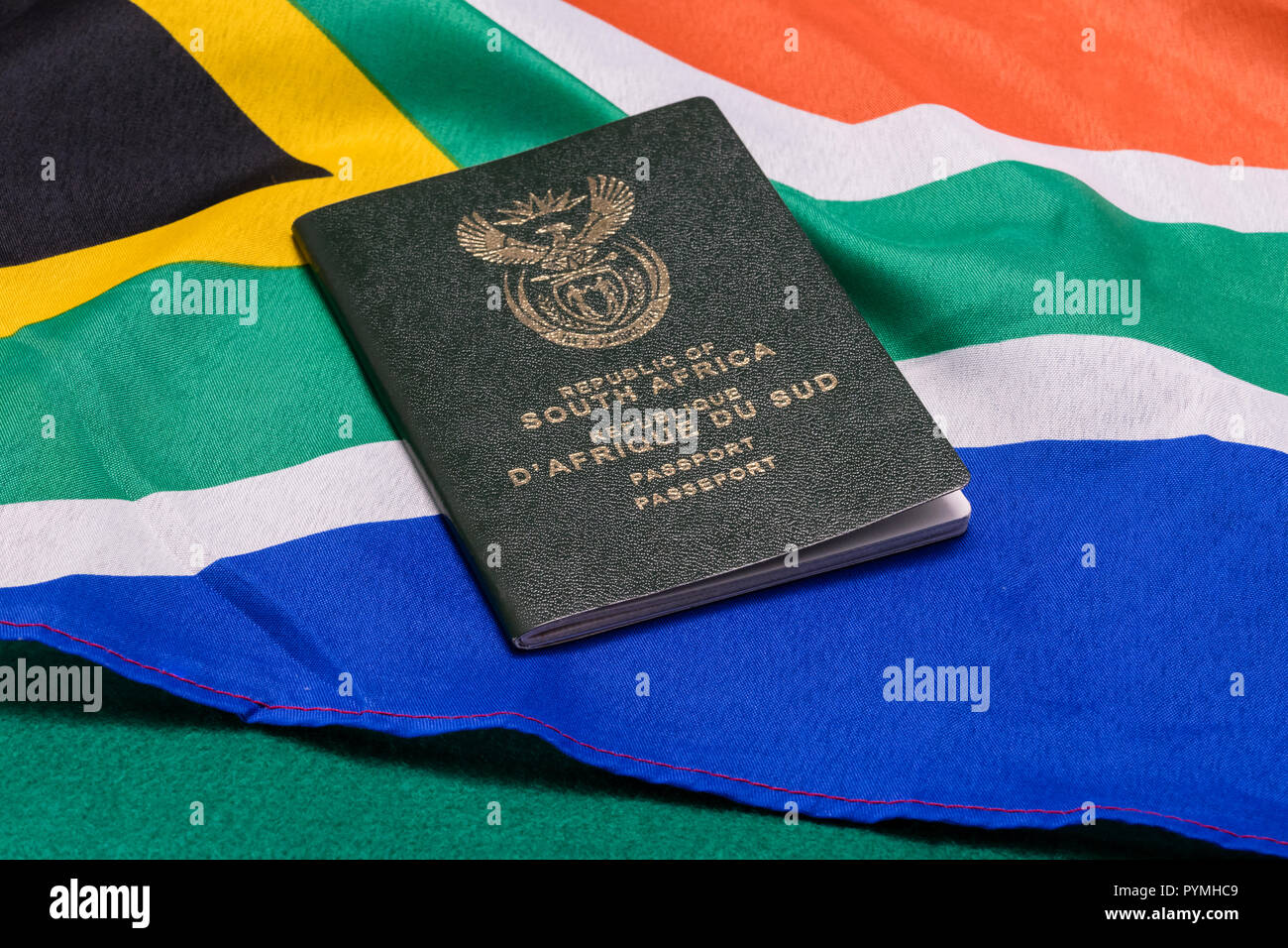 South African passport on SA flag Stock Photo - Alamy