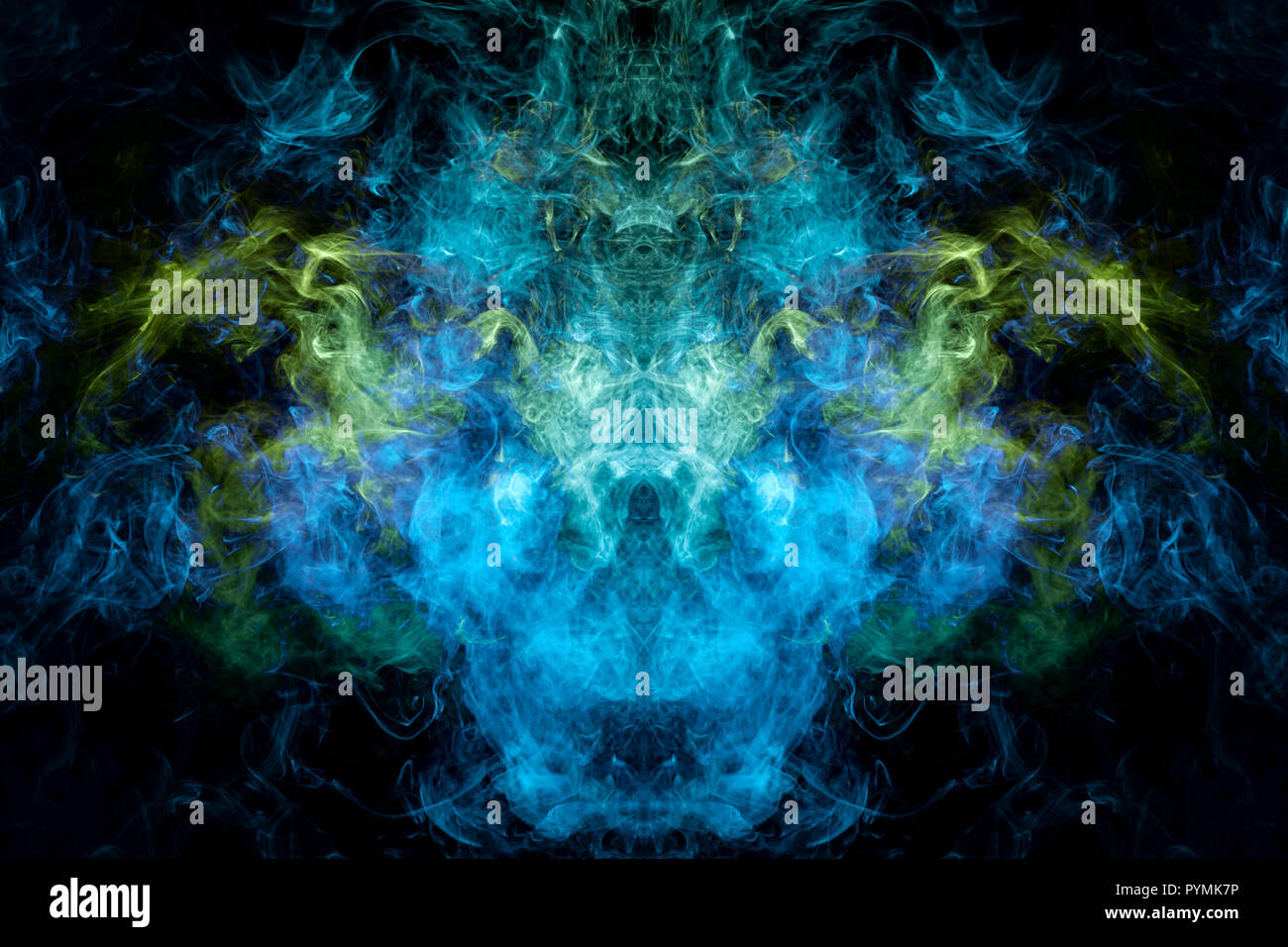 Green and blue cloud of smoke of black isolated background in the form ...