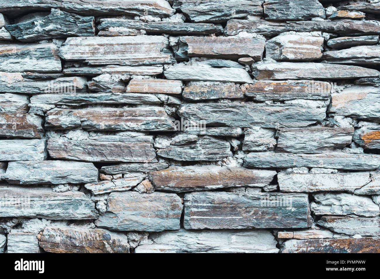 Old grey stone wall texture Stock Photo - Alamy