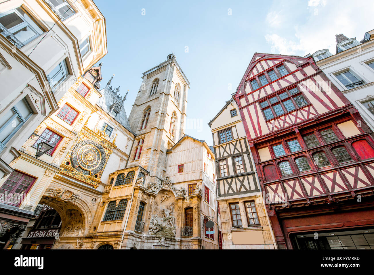 Street view with ancient buildings and Great clock on renaissance arch ...