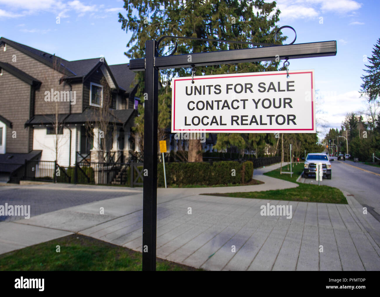 Units for sale contact your local realtor sing. In front of a house in ...