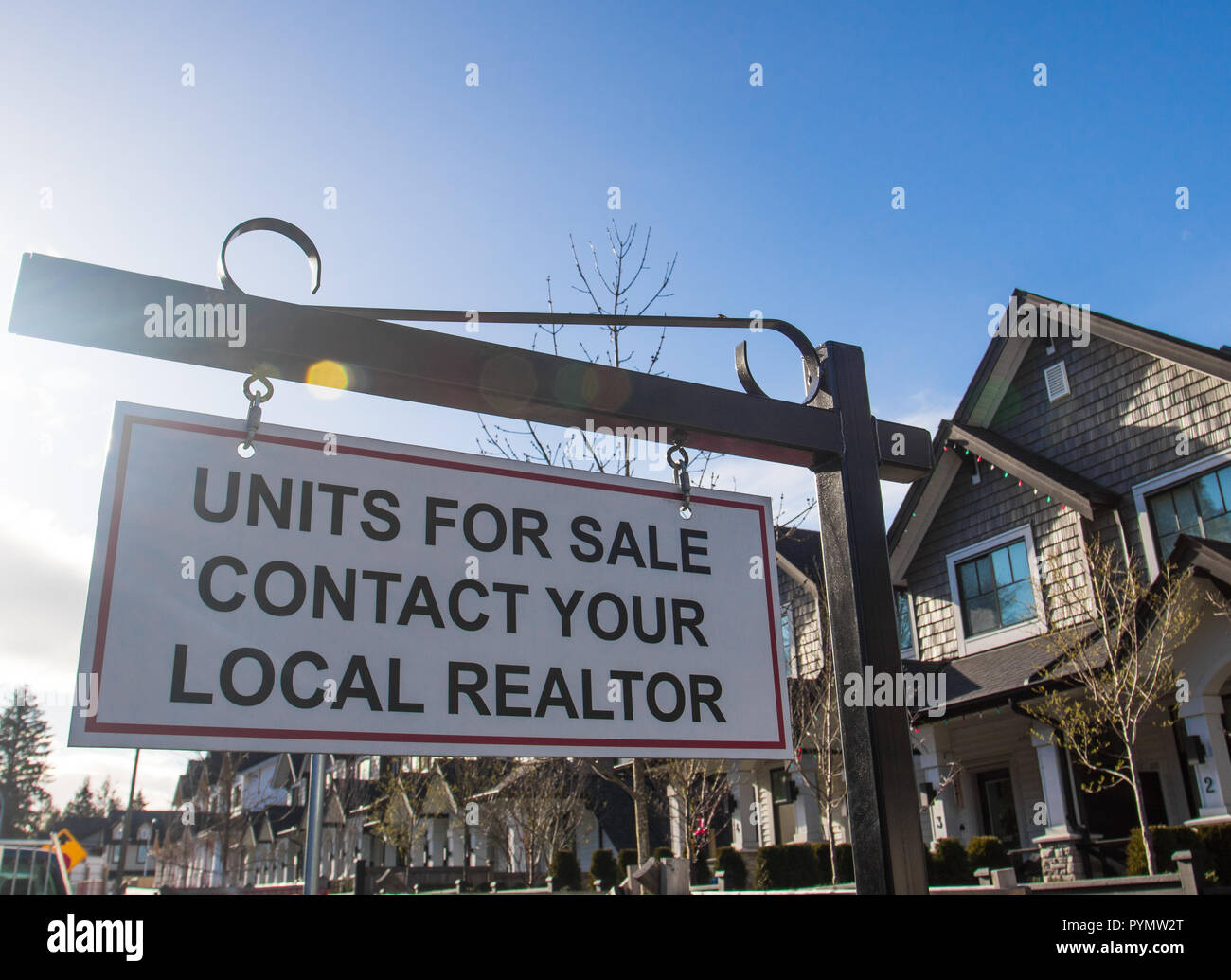 Units for sale contact your local realtor sing. In front of a house in ...