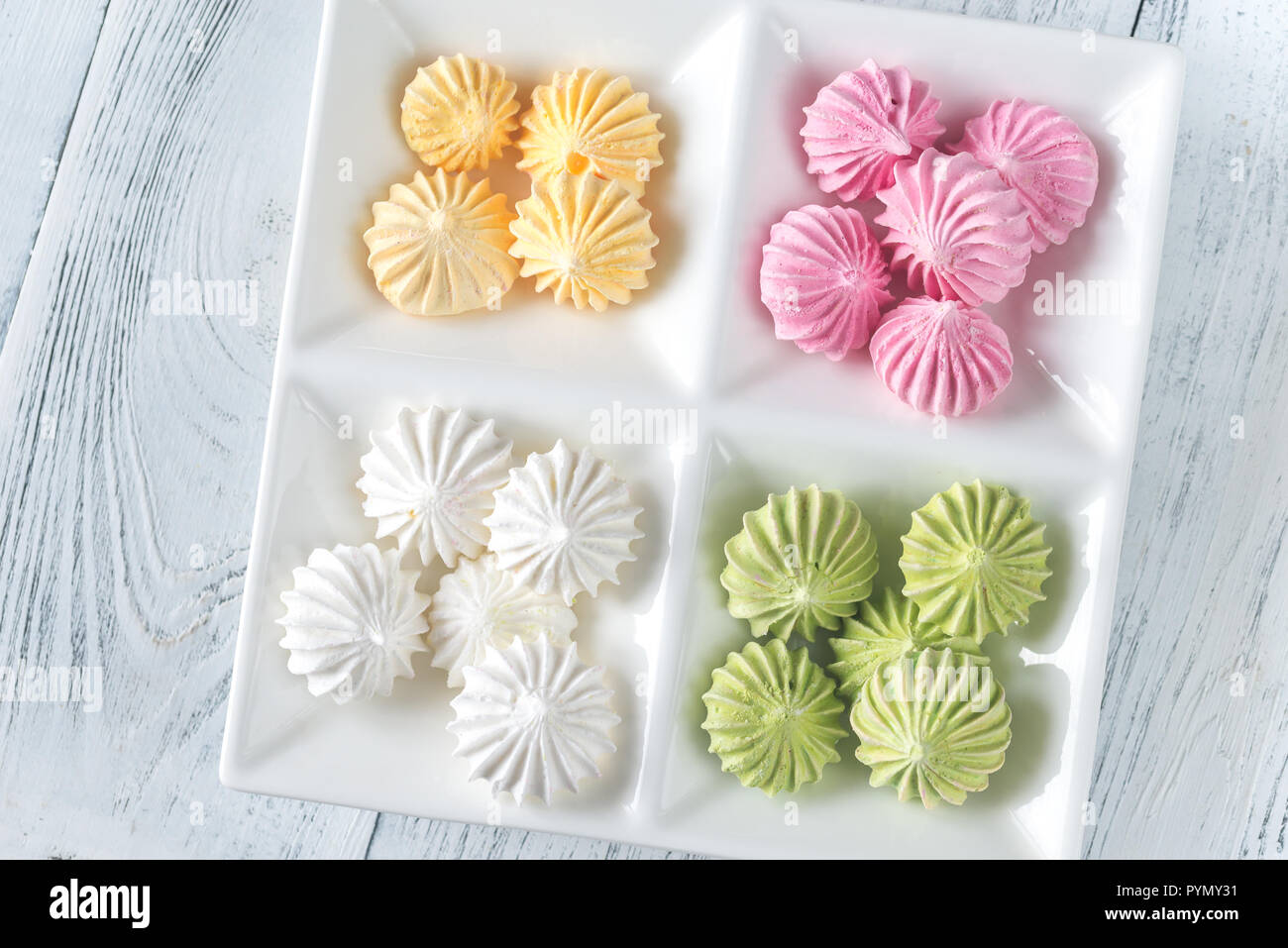 Bowl of colored meringues Stock Photo - Alamy