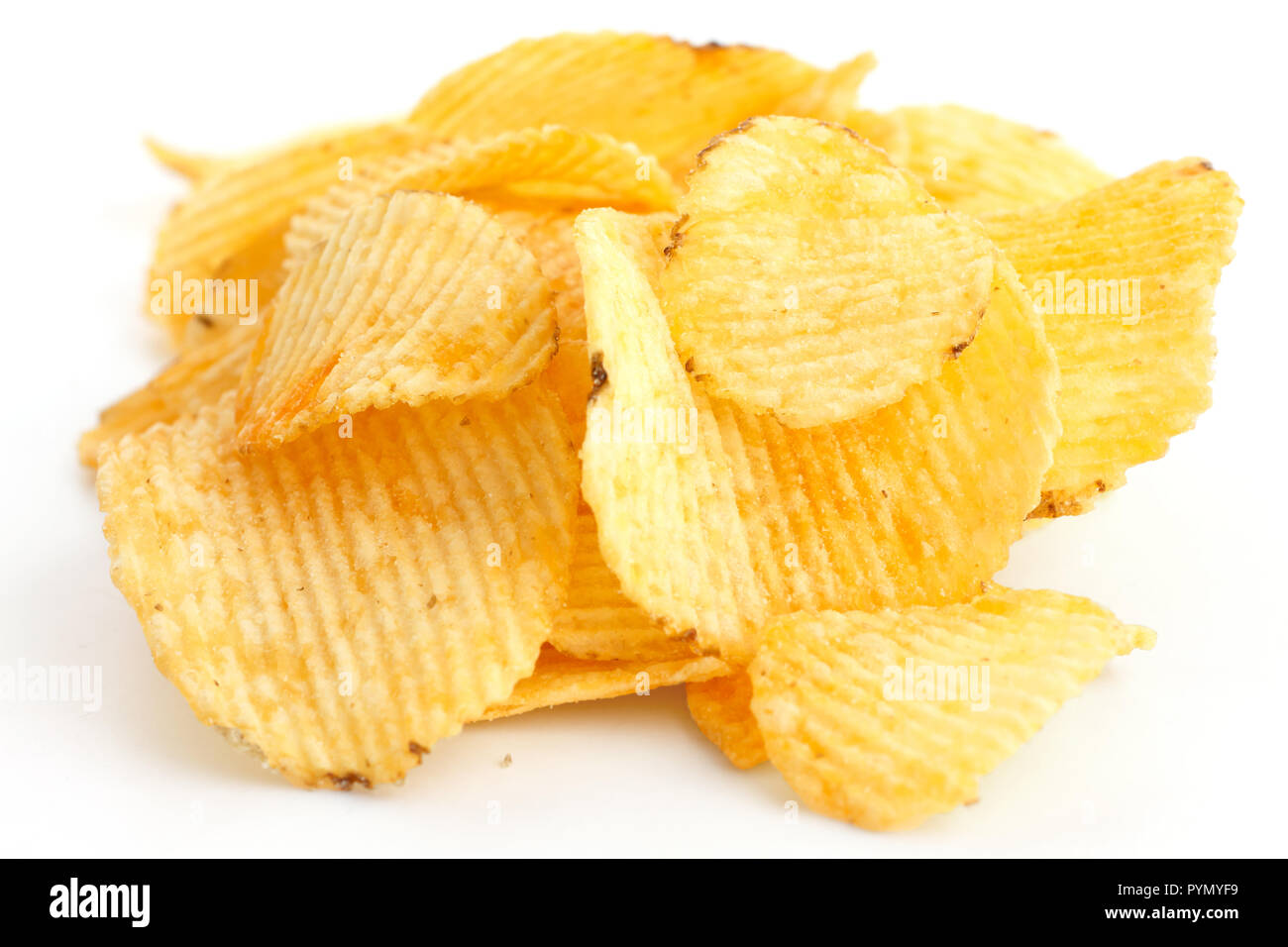 Crinkle cut crisps on white background Stock Photo - Alamy