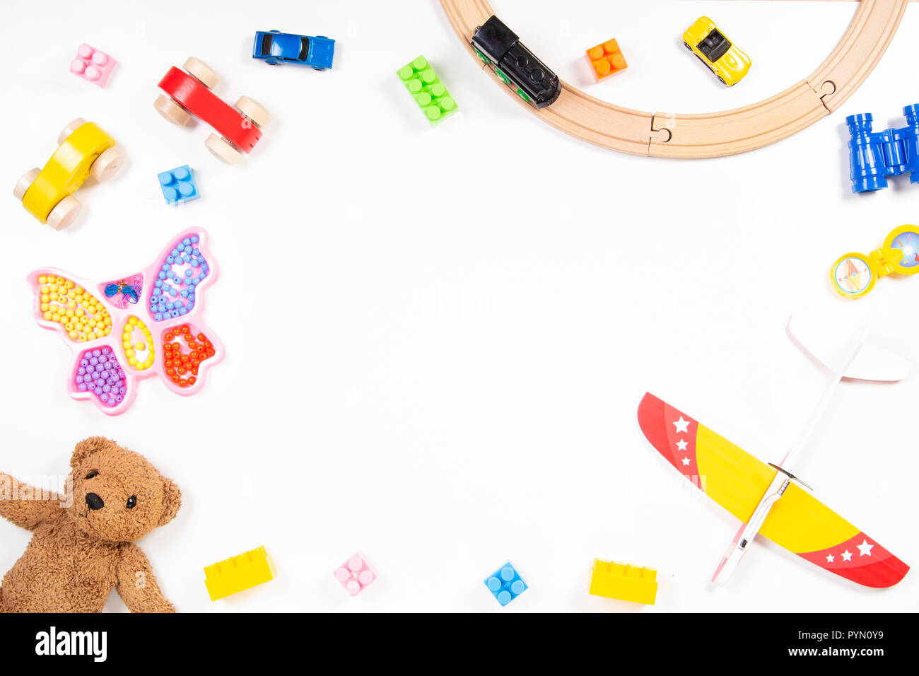 Colorful kids toys frame on white background. Top view. Flat lay Stock ...
