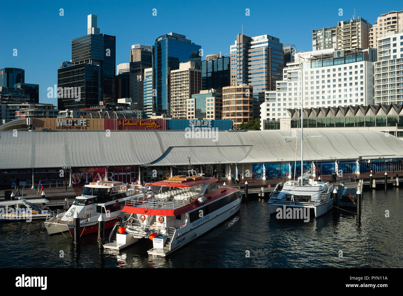 Waterfront harbourfront water harbor boats bridge hi-res stock ...