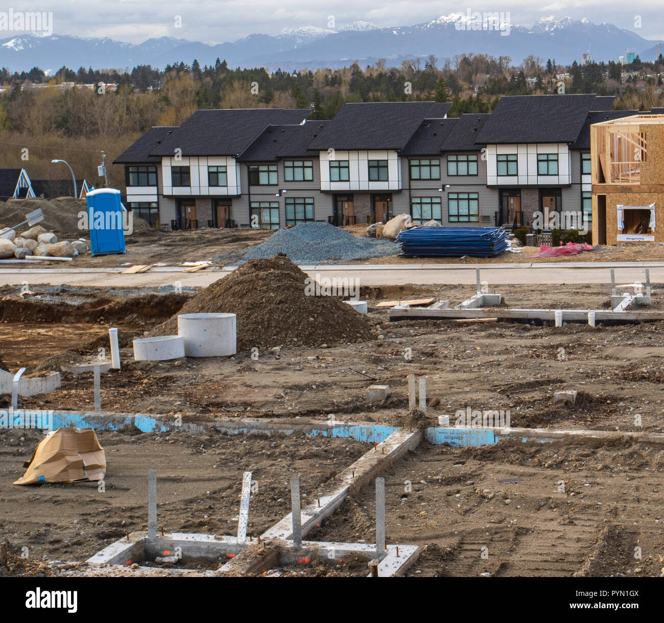 Wood townhouse building under construction Stock Photo - Alamy