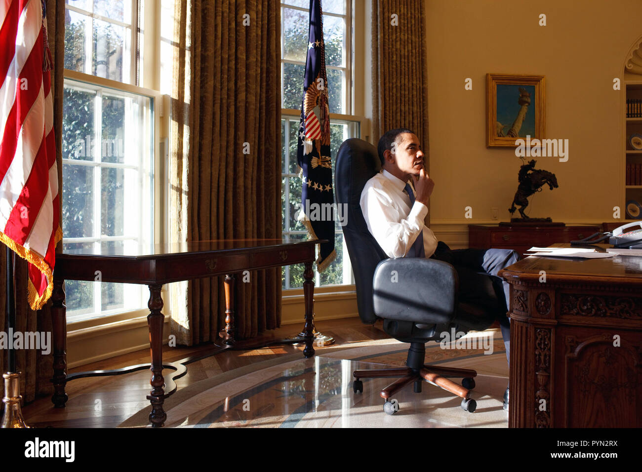 President Barack Obama in the Oval Office on his first day in office 1 ...